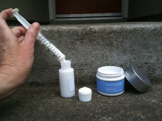 Decanting thick creams and pastes using an oral syringe | Lady Light Travel